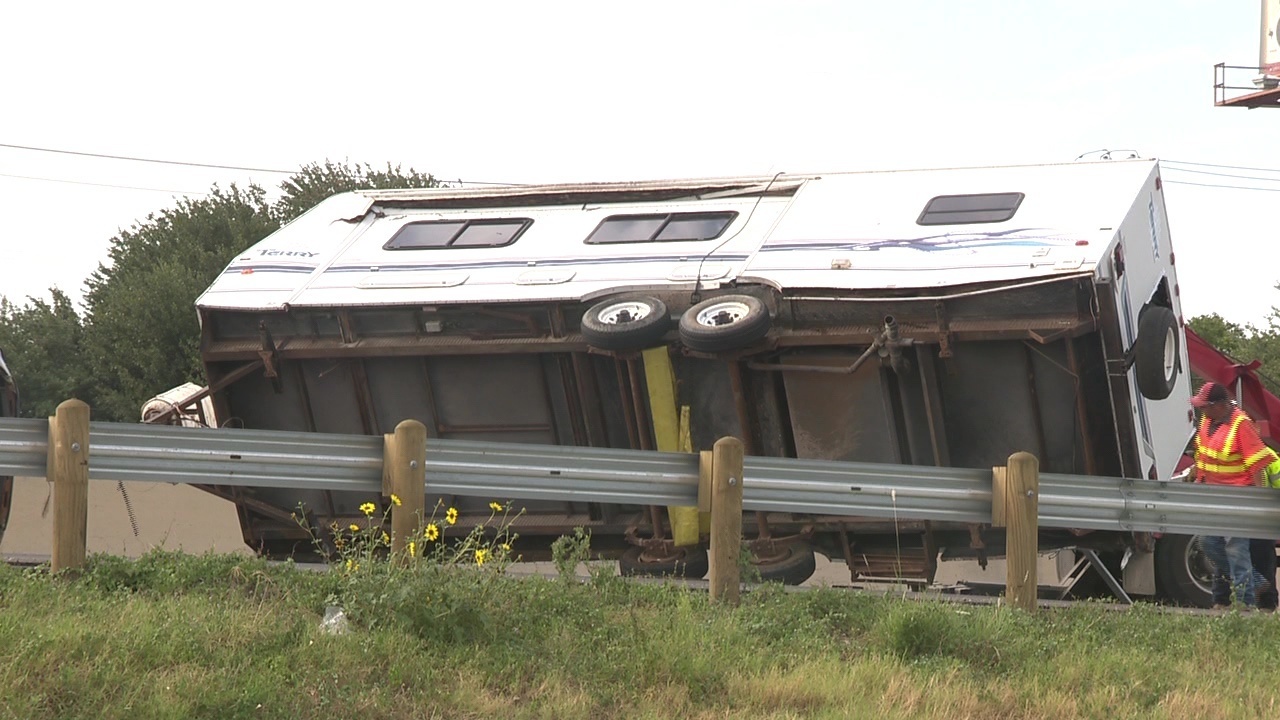 Gust of wind blows over recreational vehicle, causing traffic...